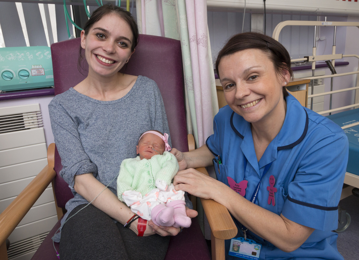 Neonatal nurses and midwives work together to care for new-born babies ...